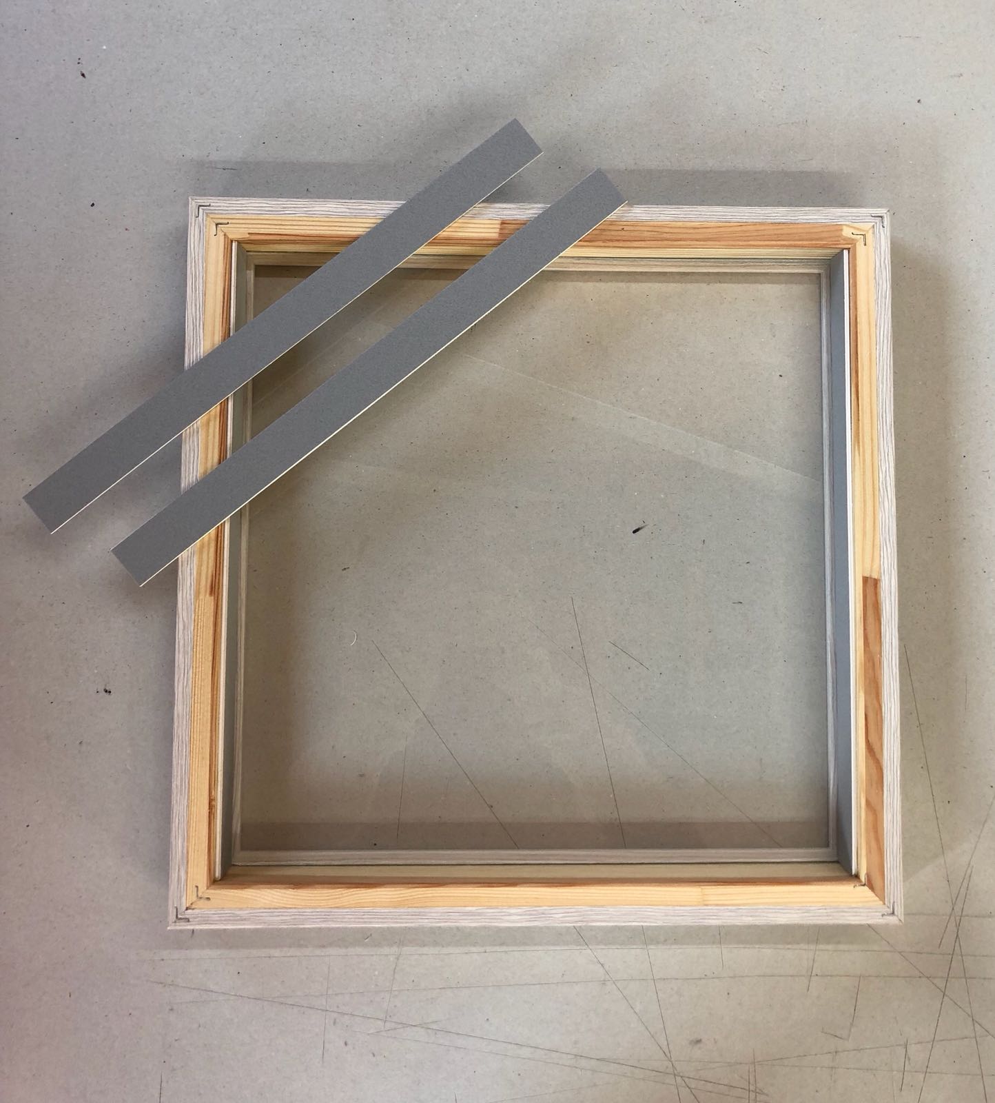 Inlijsten kleding - Lijstenmakerij 't nieuwe schuurtje